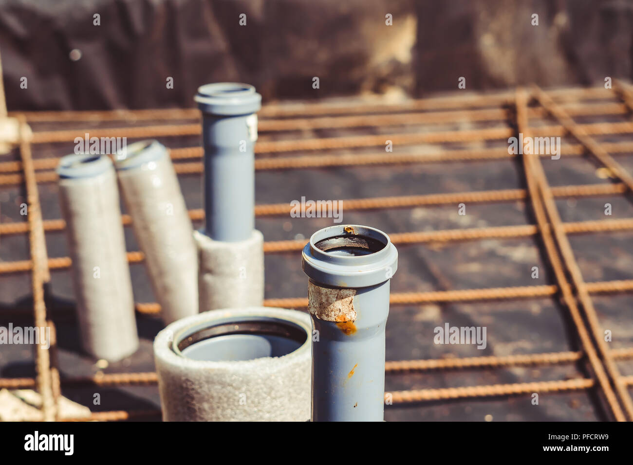 Sewer pipes in the new Foundation are prepared for pouring concrete ...