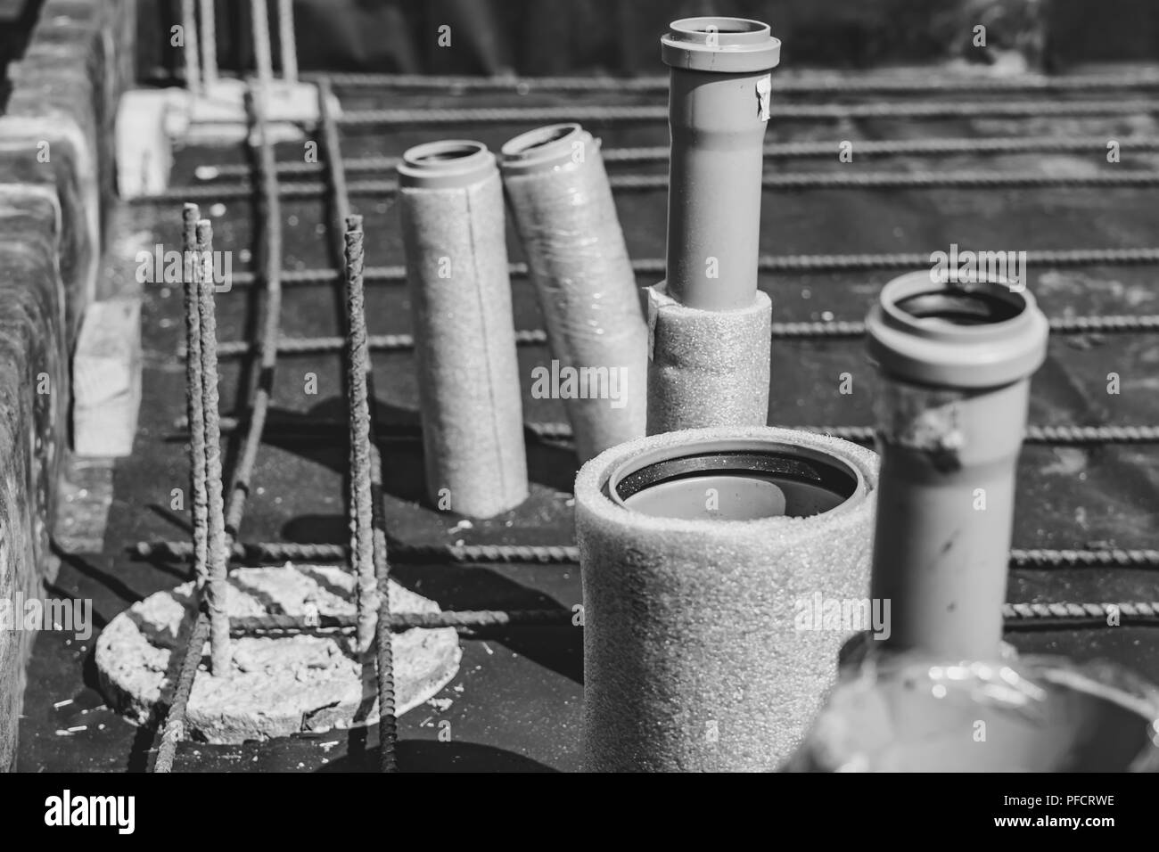 Sewer pipes in the new Foundation are prepared for pouring concrete ...