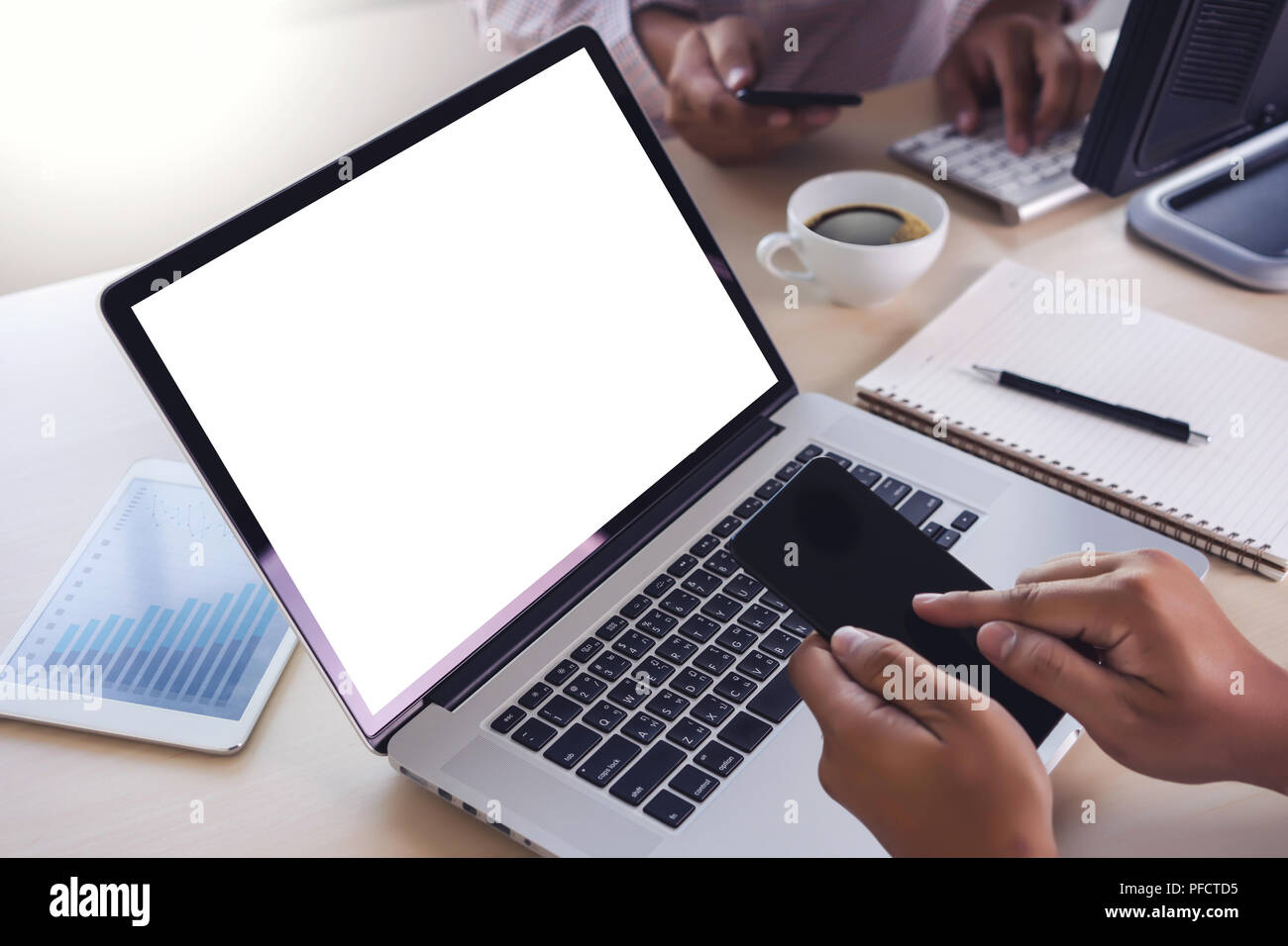 man of business man hand working on laptop computer blank white screen ...