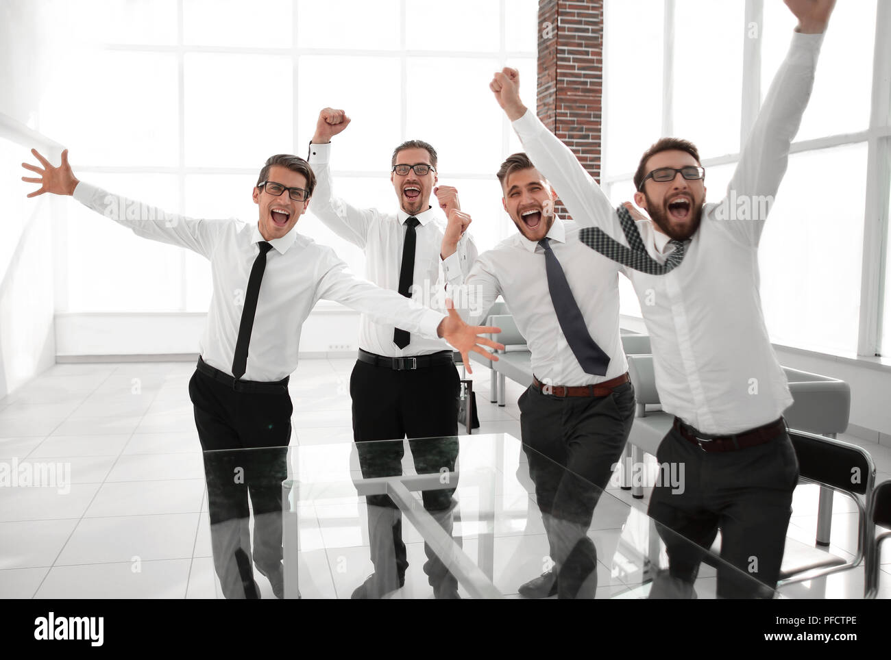 fun business team in a modern office Stock Photo - Alamy