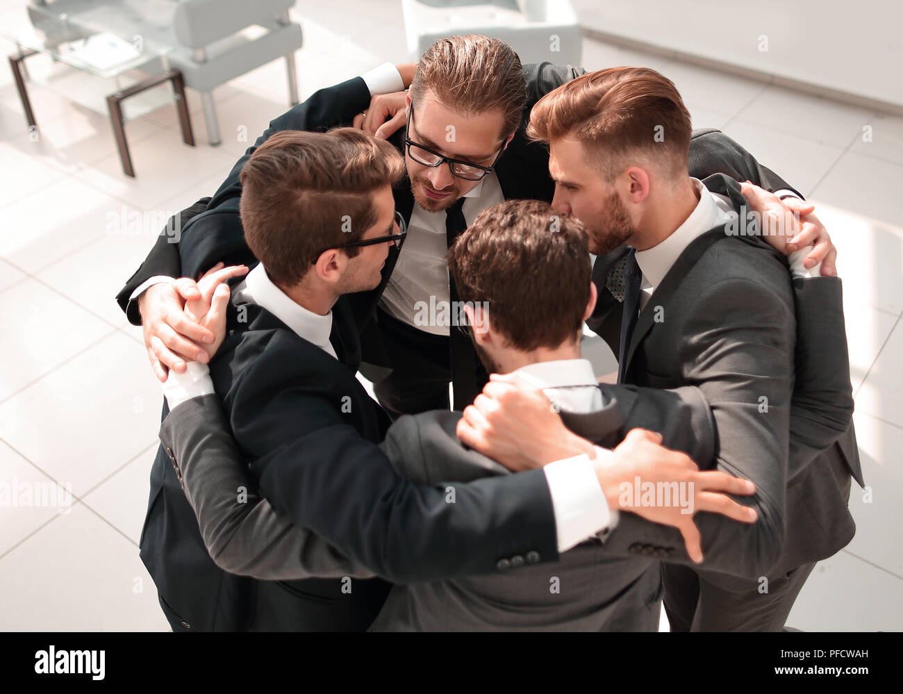 group of business people standing in a close circle Stock Photo - Alamy