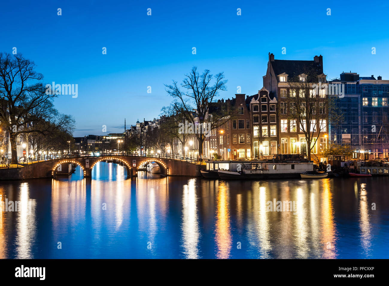 View of Amsterdam by night, Netherlands Stock Photo - Alamy