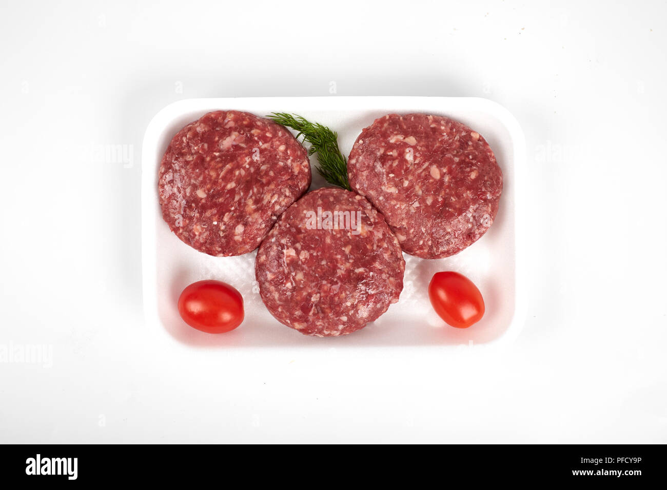 minced meat in plastic package isolated on white background Stock Photo ...