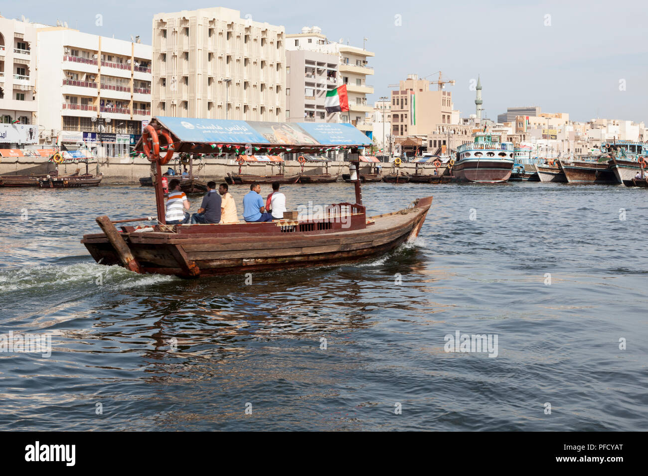Traditional abra and dhow boats on the Dubai Creek, UAE Stock Photo - Alamy
