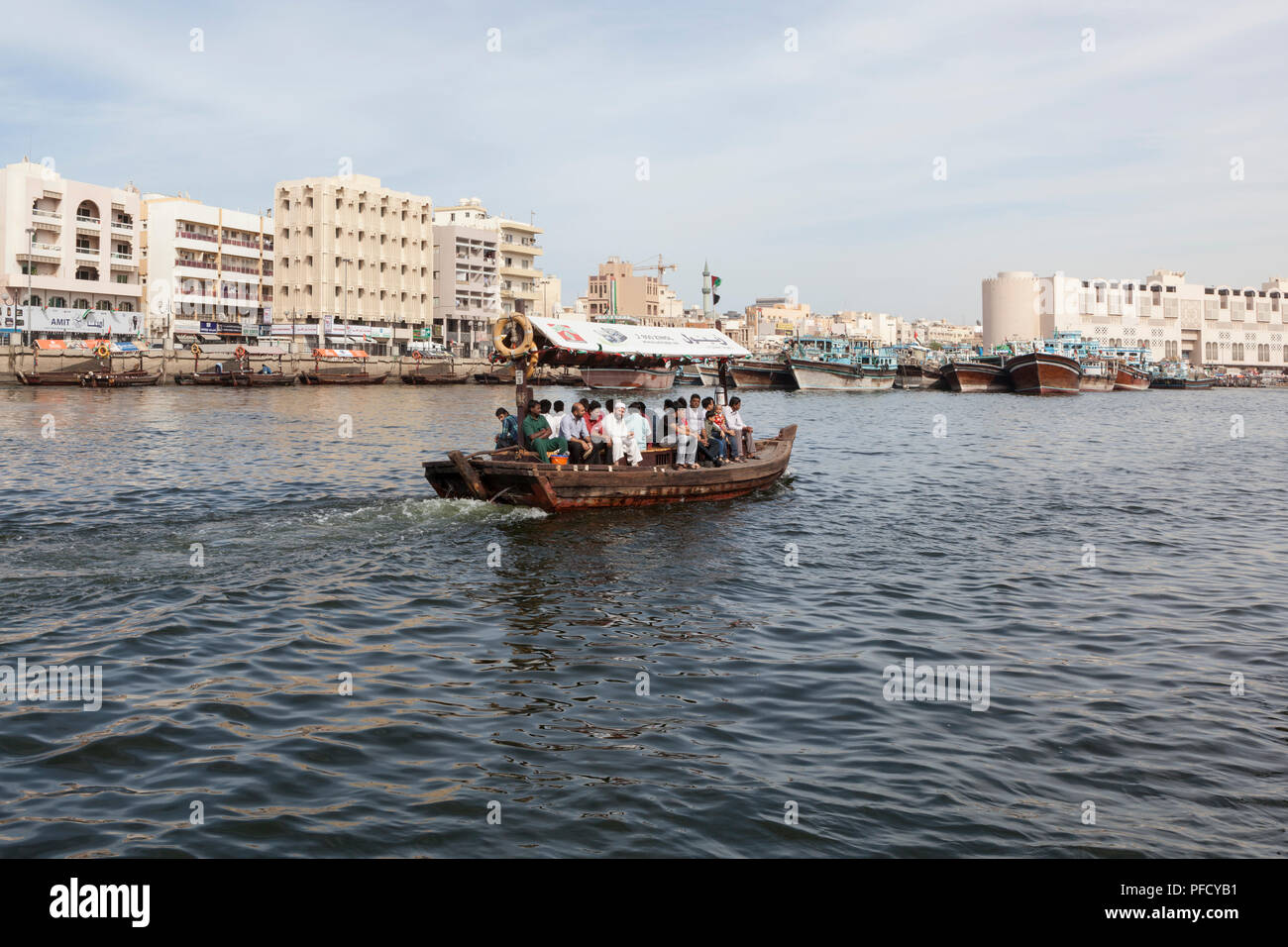 Passengers aboard an abra boat on the Dubai Creek, UAE Stock Photo - Alamy
