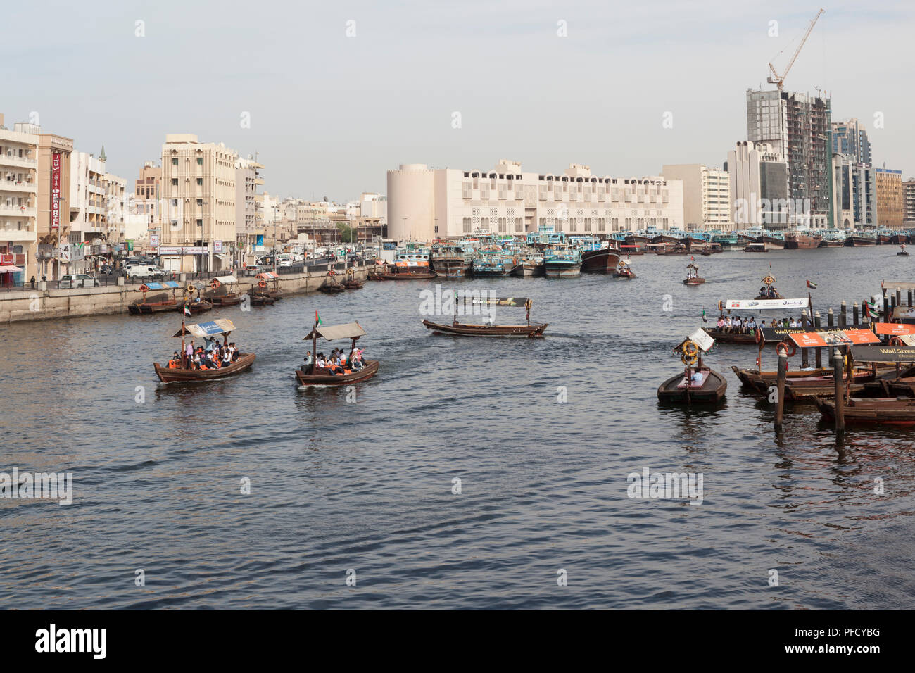 Traditional abra and dhow boats on the Dubai Creek, UAE Stock Photo - Alamy