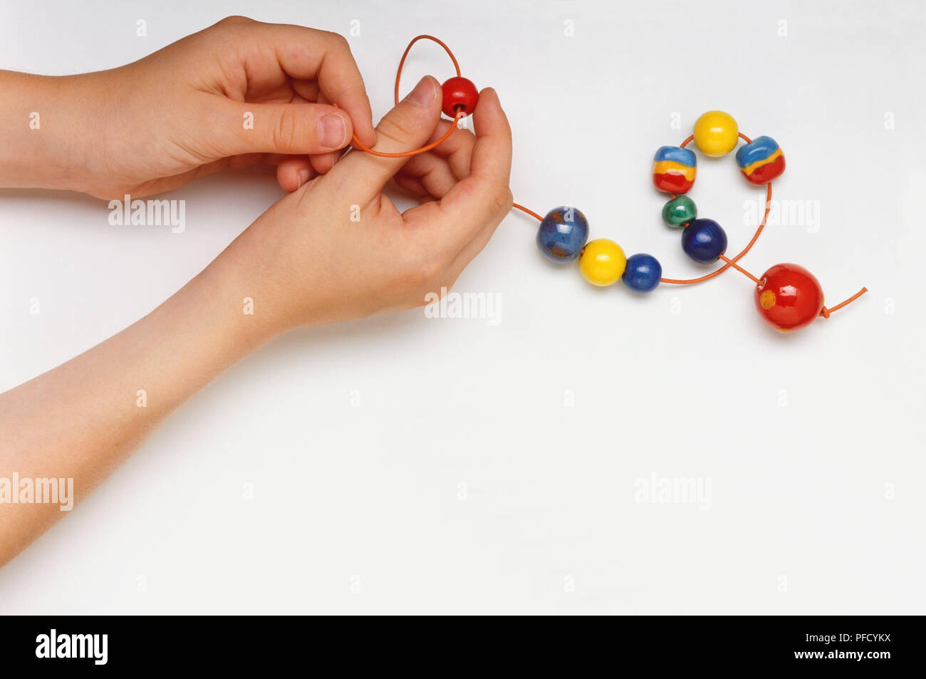 Threading beads hi-res stock photography and images - Alamy