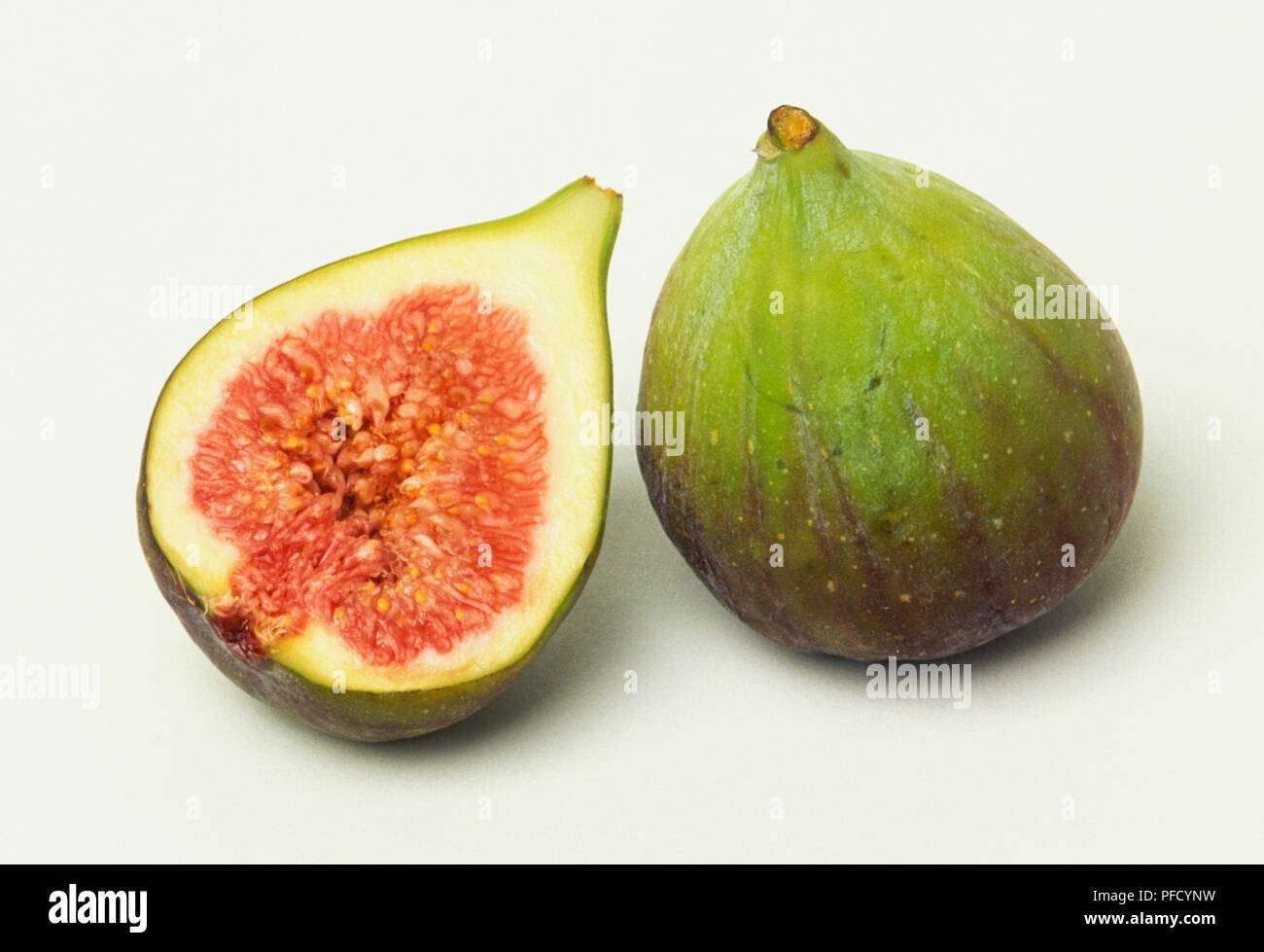Figs, whole and half Stock Photo - Alamy