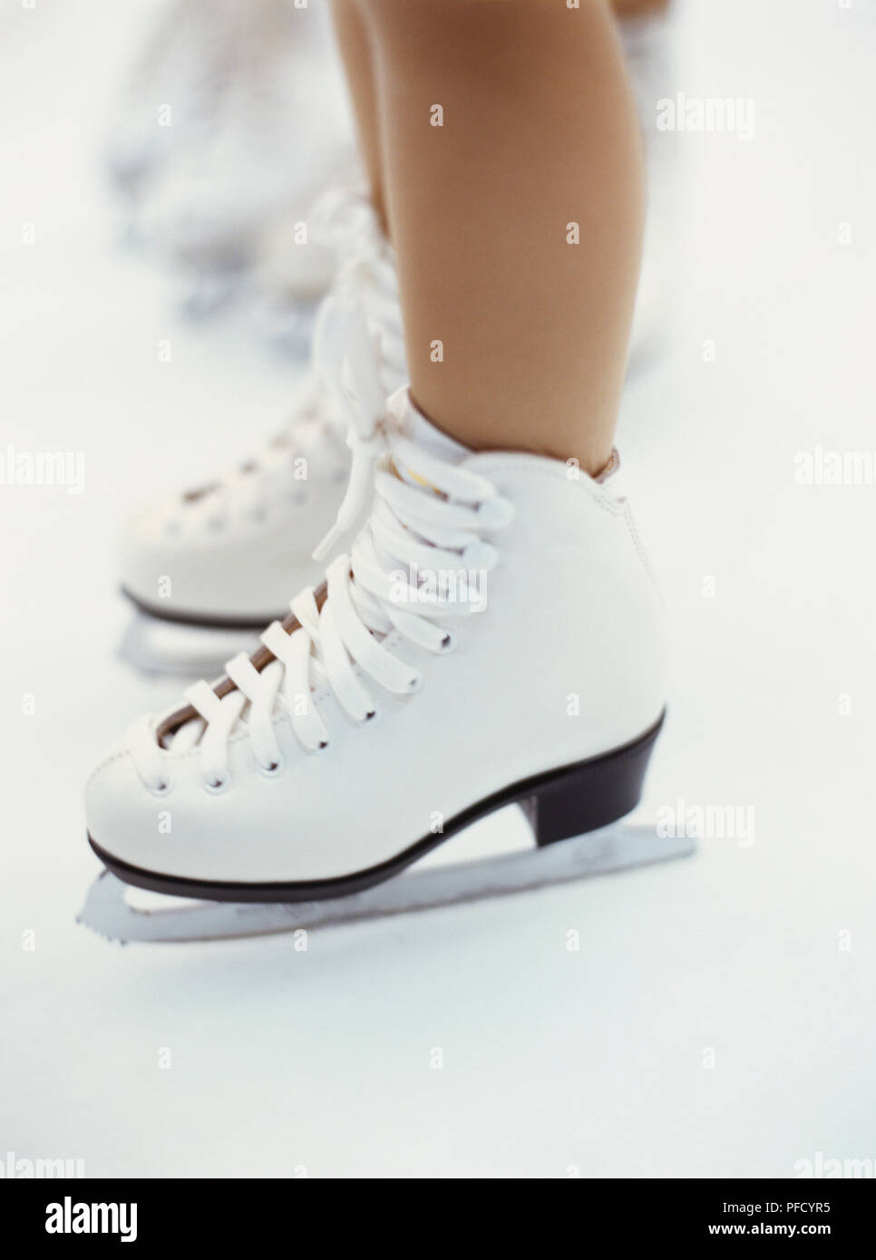 Wearing ice skates, close up, side view Stock Photo - Alamy