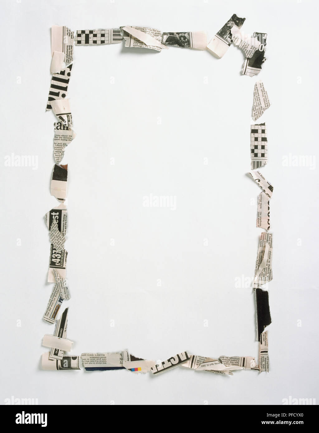 Newspaper cut in to strips forming a rectangular shape Stock Photo - Alamy