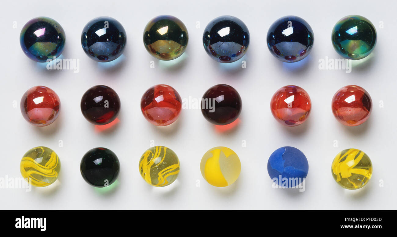 Rows of coloured glass marbles, front view Stock Photo - Alamy