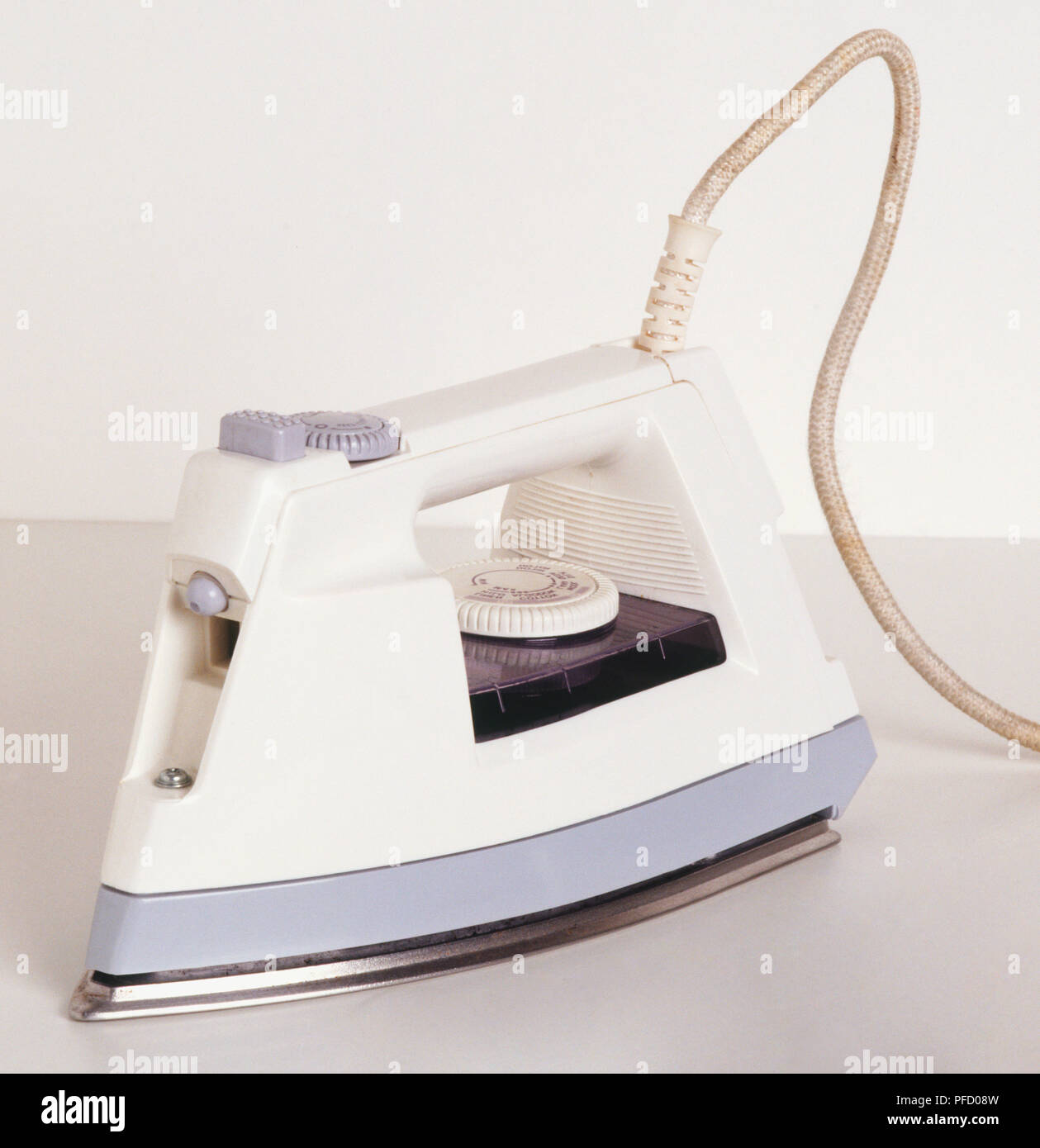 Electrical iron, side view Stock Photo - Alamy
