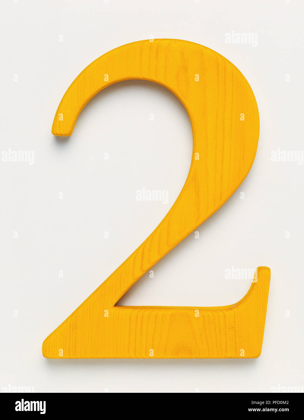 Yellow number '2' made from wood Stock Photo - Alamy
