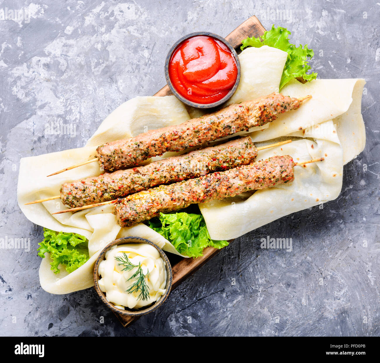 Turkish traditional dish meat kebab with herbs and spices.Eastern food ...