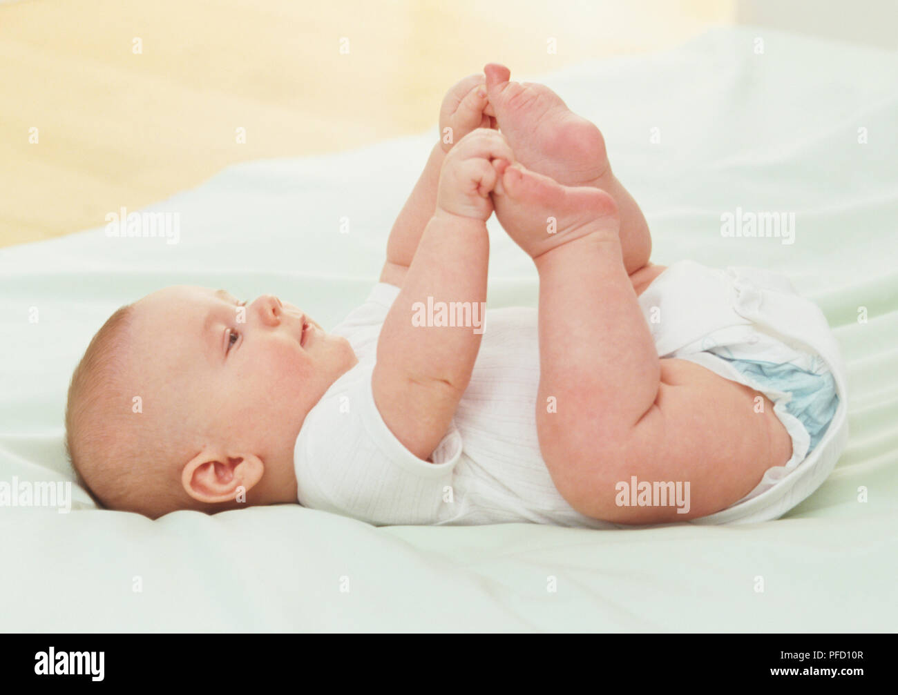 Clutching at the back hi-res stock photography and images - Alamy