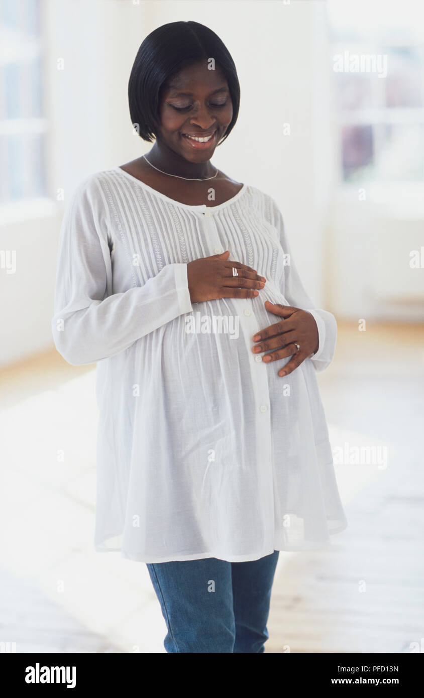 Touching bellies hi-res stock photography and images - Alamy