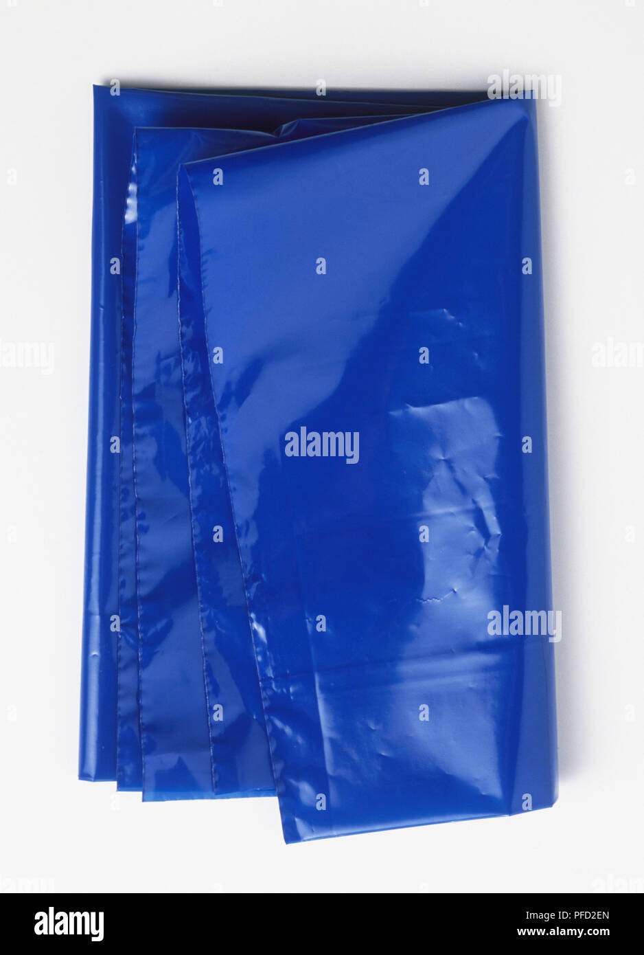 Blue plastic material, folded Stock Photo - Alamy