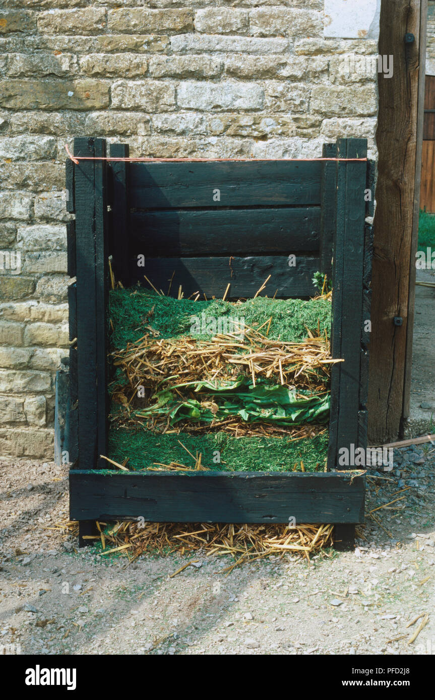 Layered compost in a compost container Stock Photo - Alamy
