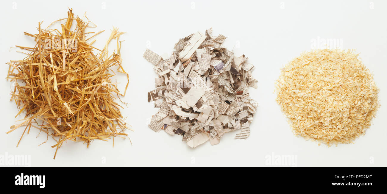 Straw, shredded paper and pile of saw dust Stock Photo - Alamy