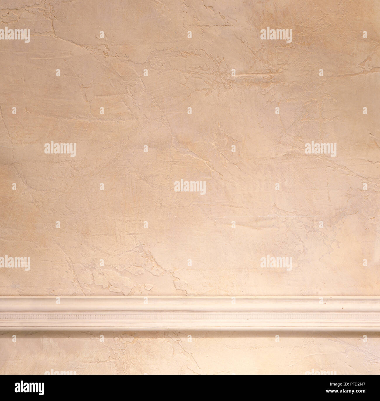 Cream coloured, plastered wall with moulding, close-up Stock Photo - Alamy