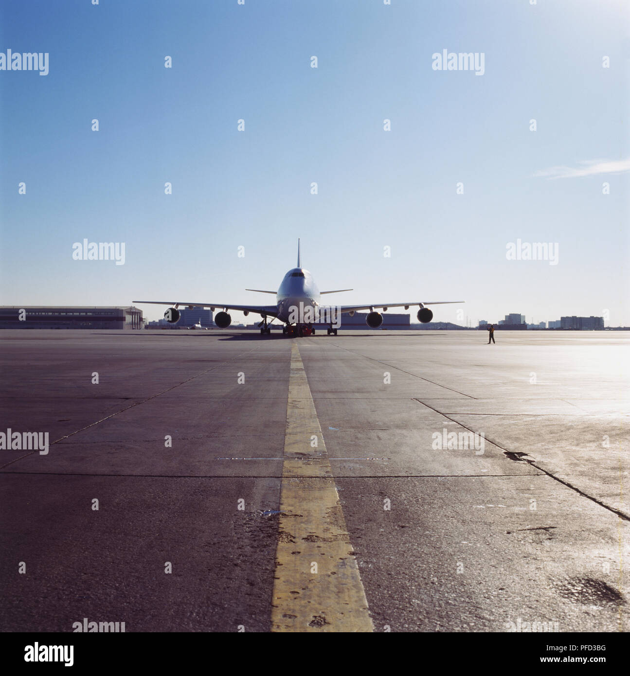 Passenger jet on tarmac, front view Stock Photo - Alamy