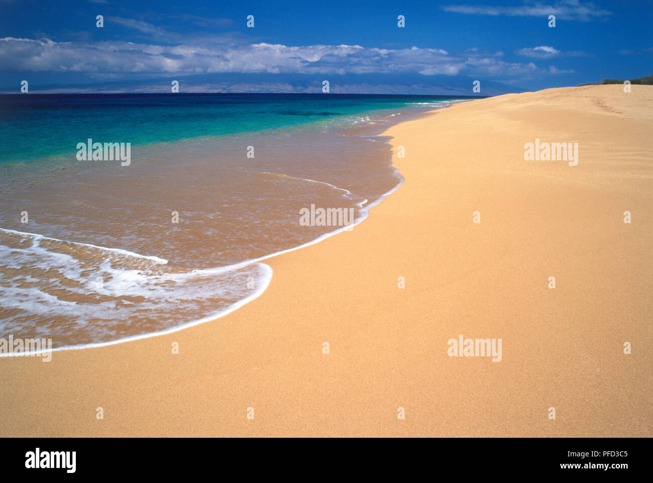 USA, Hawaii Islands, Lana'i, Polihua Beach, water lapping onto beach of ...