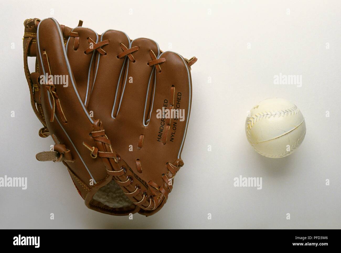 Baseball glove and ball Stock Photo - Alamy