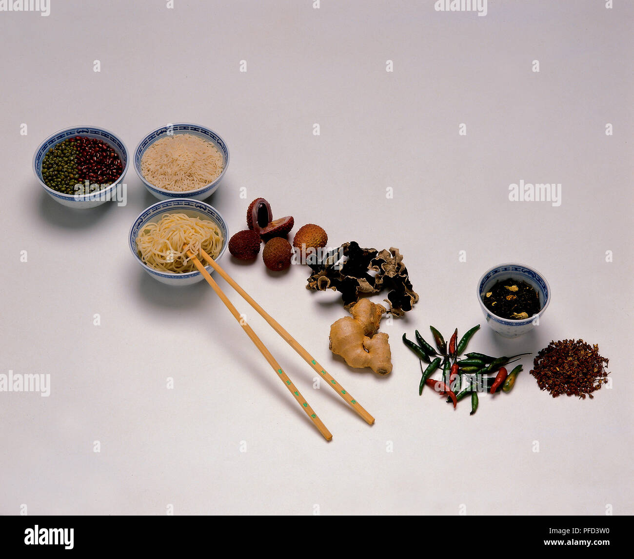 Chinese cooking ingredients, including rice, soya beans, noodles, root ...