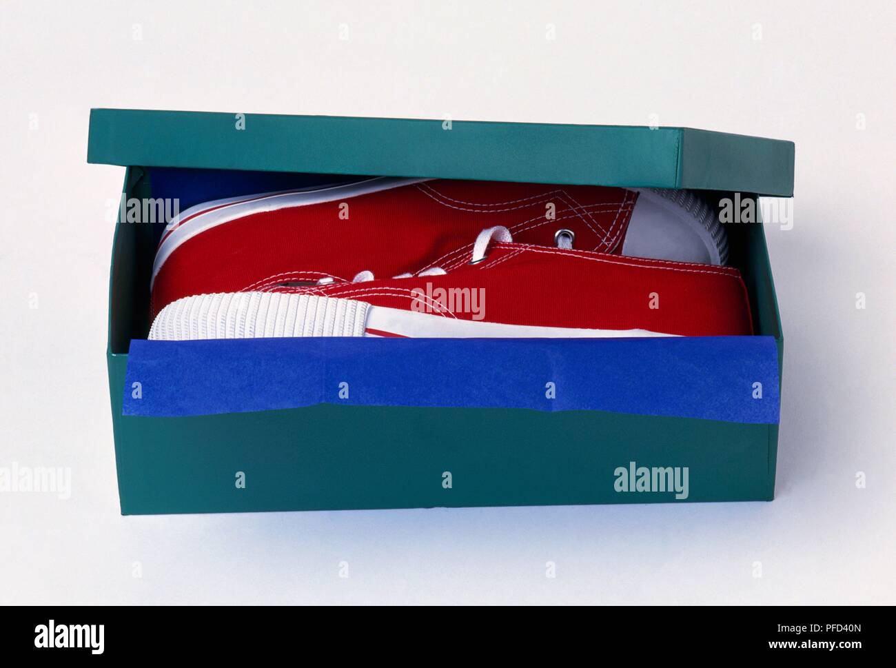 Pair of sneakers inside shoebox Stock Photo - Alamy