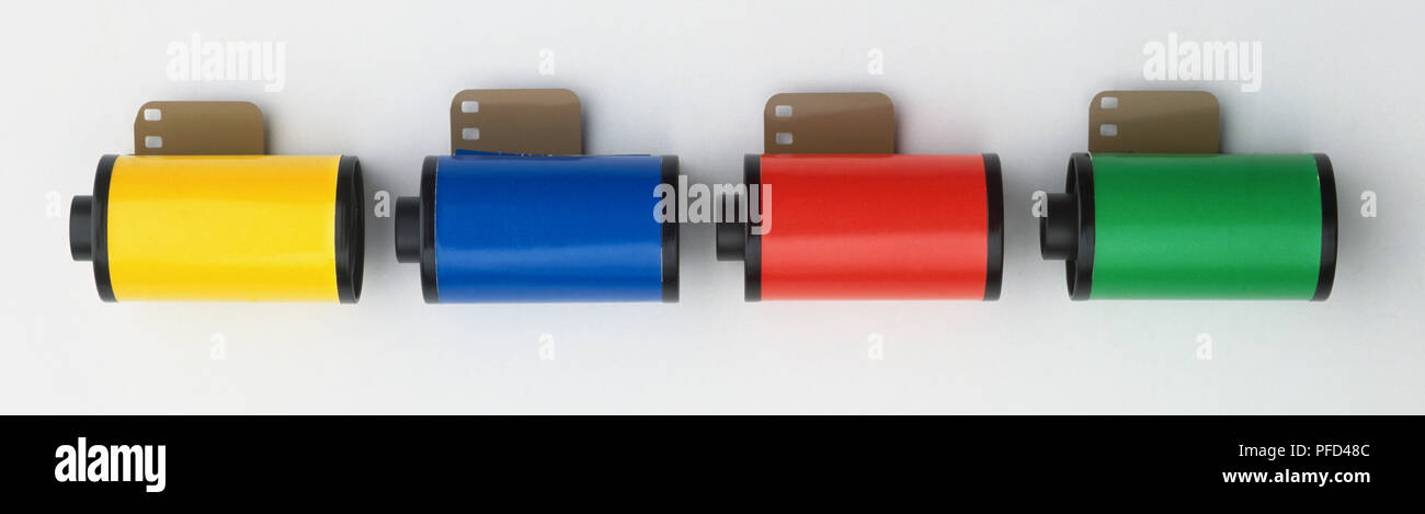 Yellow, blue, red, and green rolls of camera film Stock Photo - Alamy