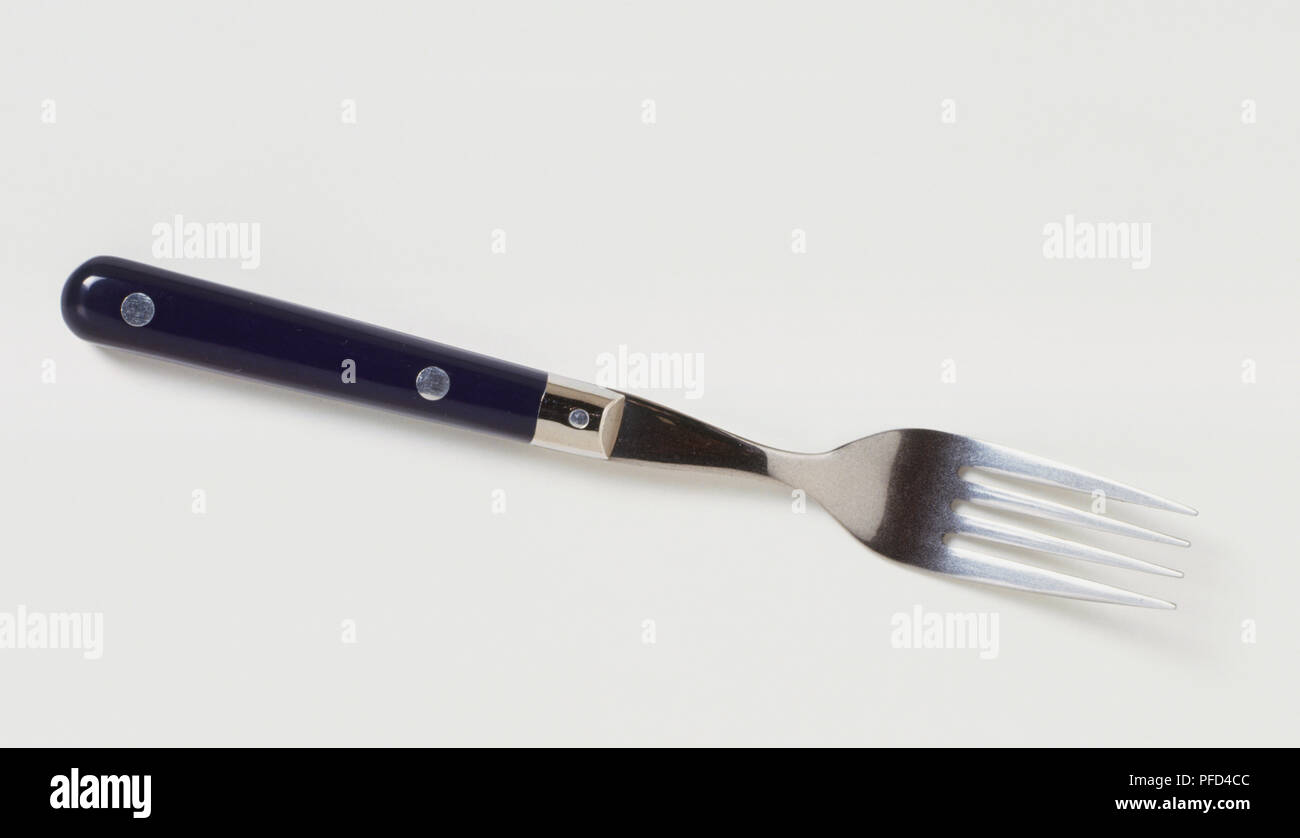 Black handled fork Stock Photo - Alamy