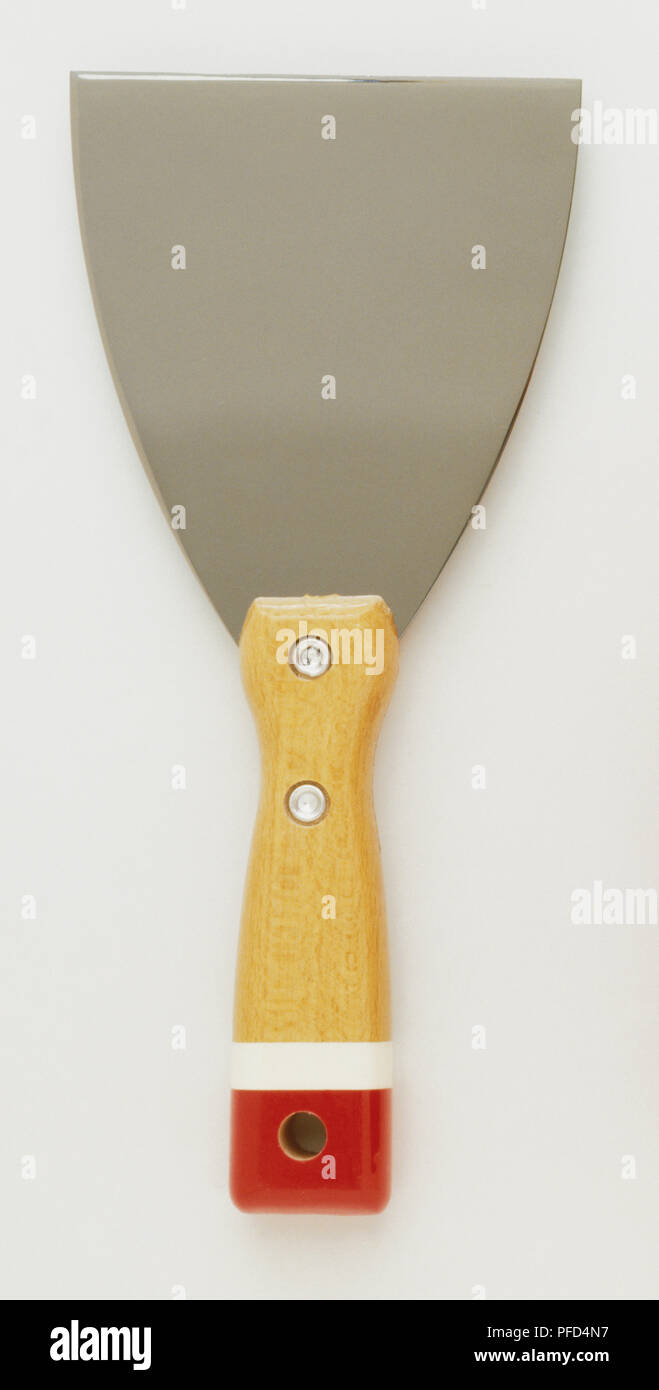 A scraper with a red, white and plain wooden handle Stock Photo - Alamy