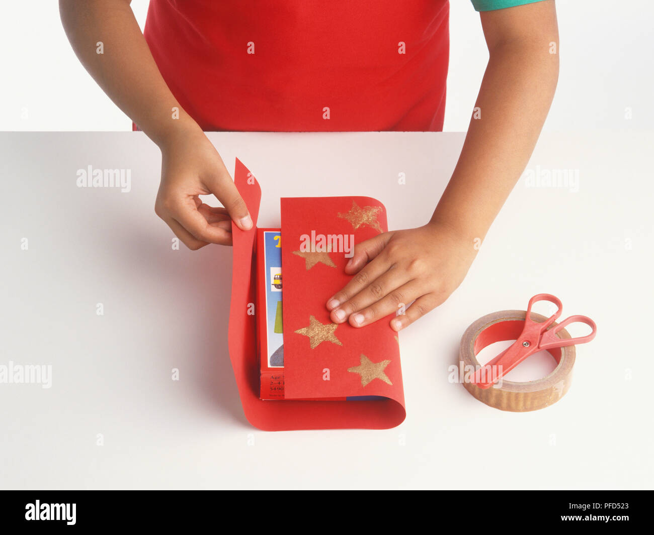 Wrapping a present Stock Photo - Alamy