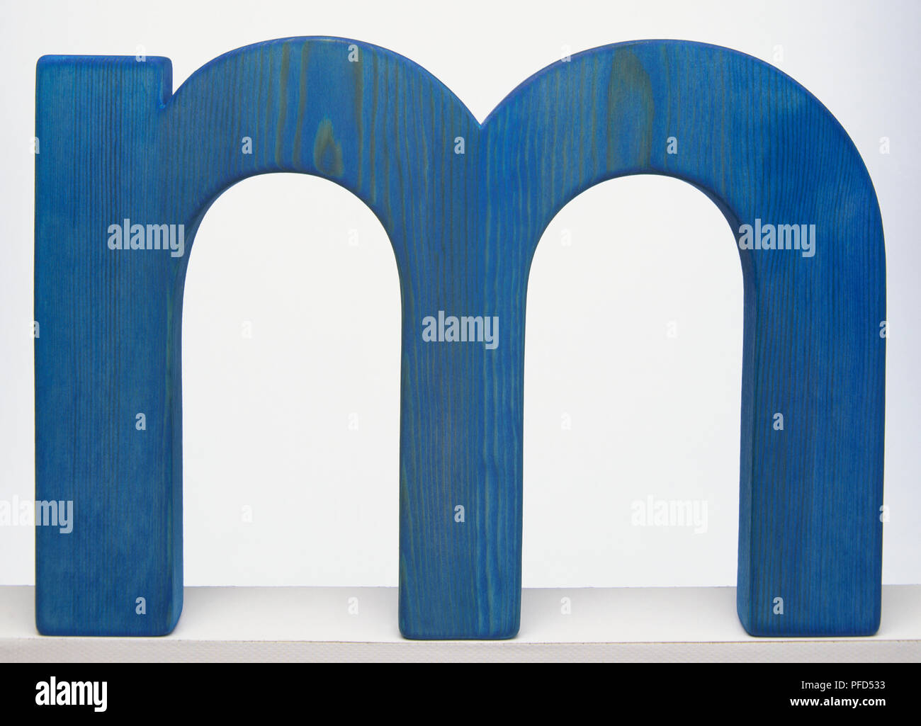 Blue wooden letter 'm' Stock Photo - Alamy