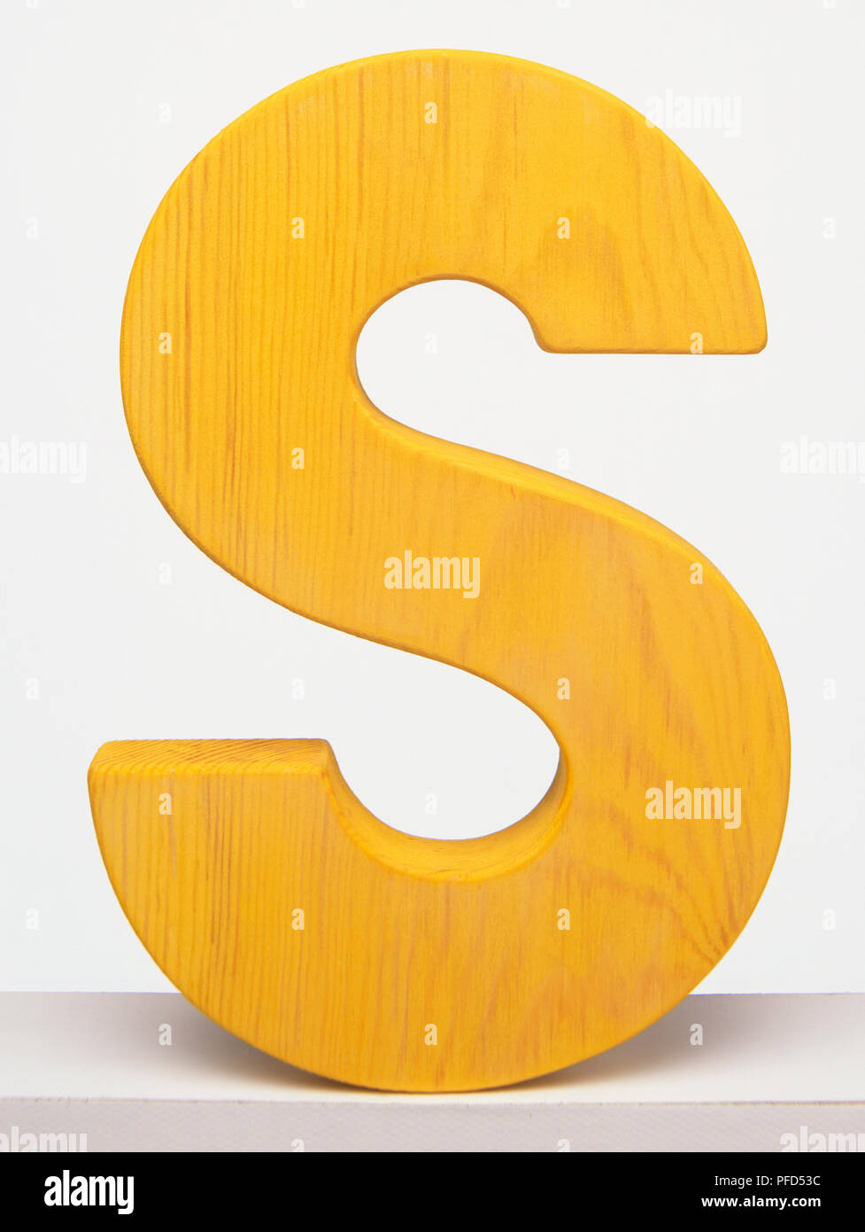 Yellow wooden letter 's' Stock Photo - Alamy
