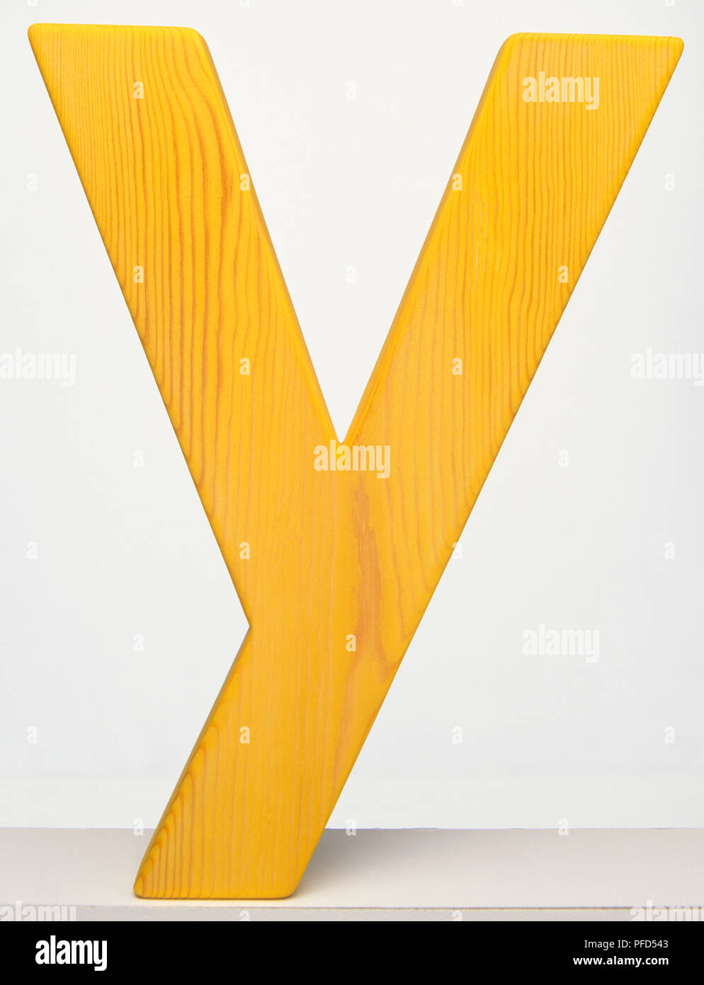 Yellow wooden letter 'y' Stock Photo - Alamy