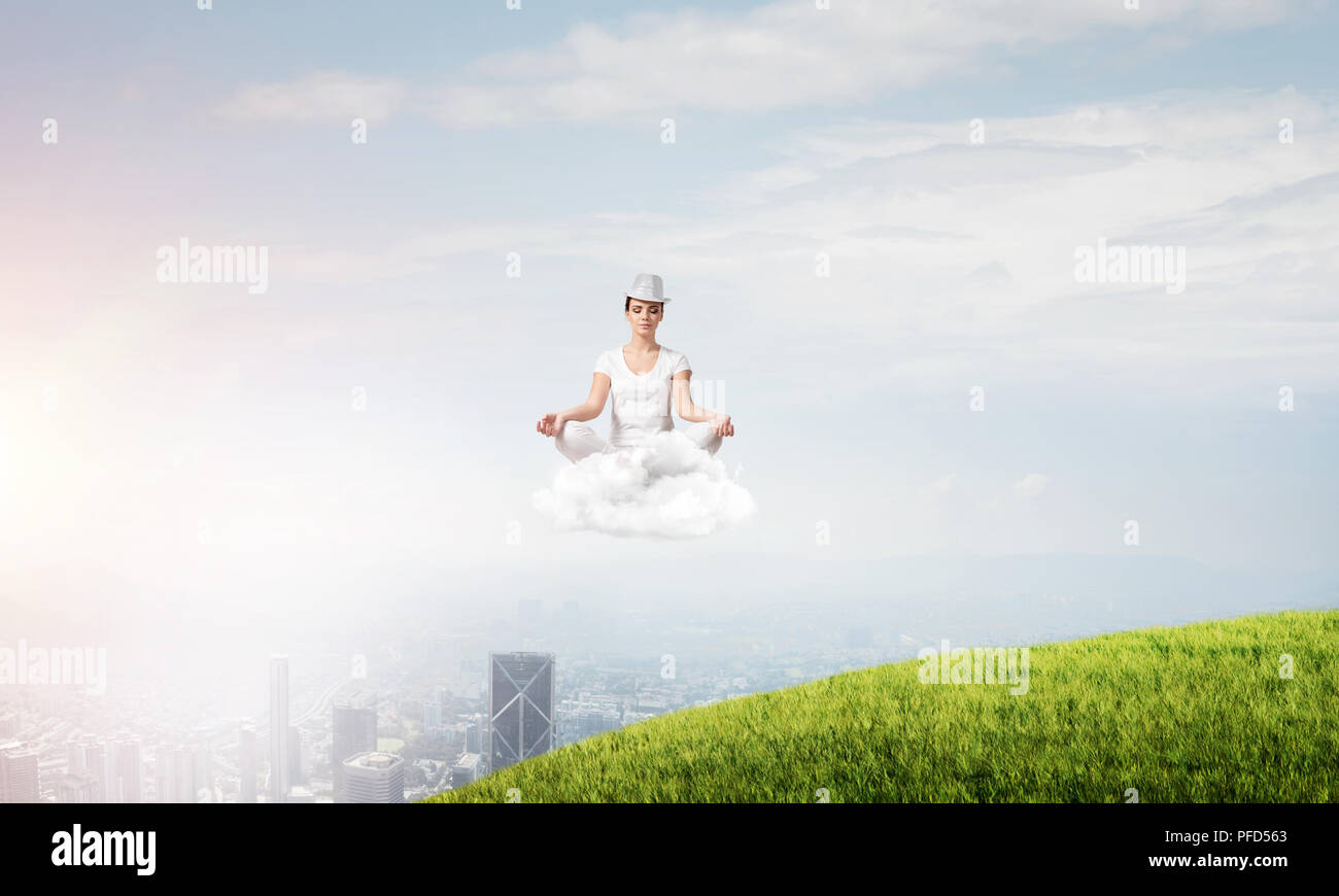 Young woman keeping mind conscious Stock Photo - Alamy