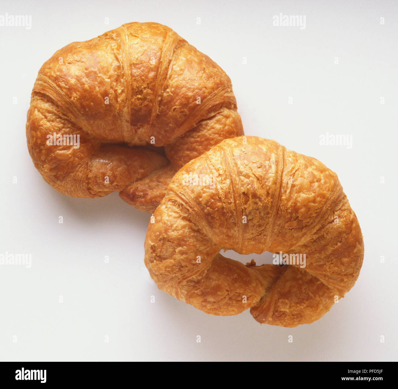 Two plain croissants Stock Photo - Alamy