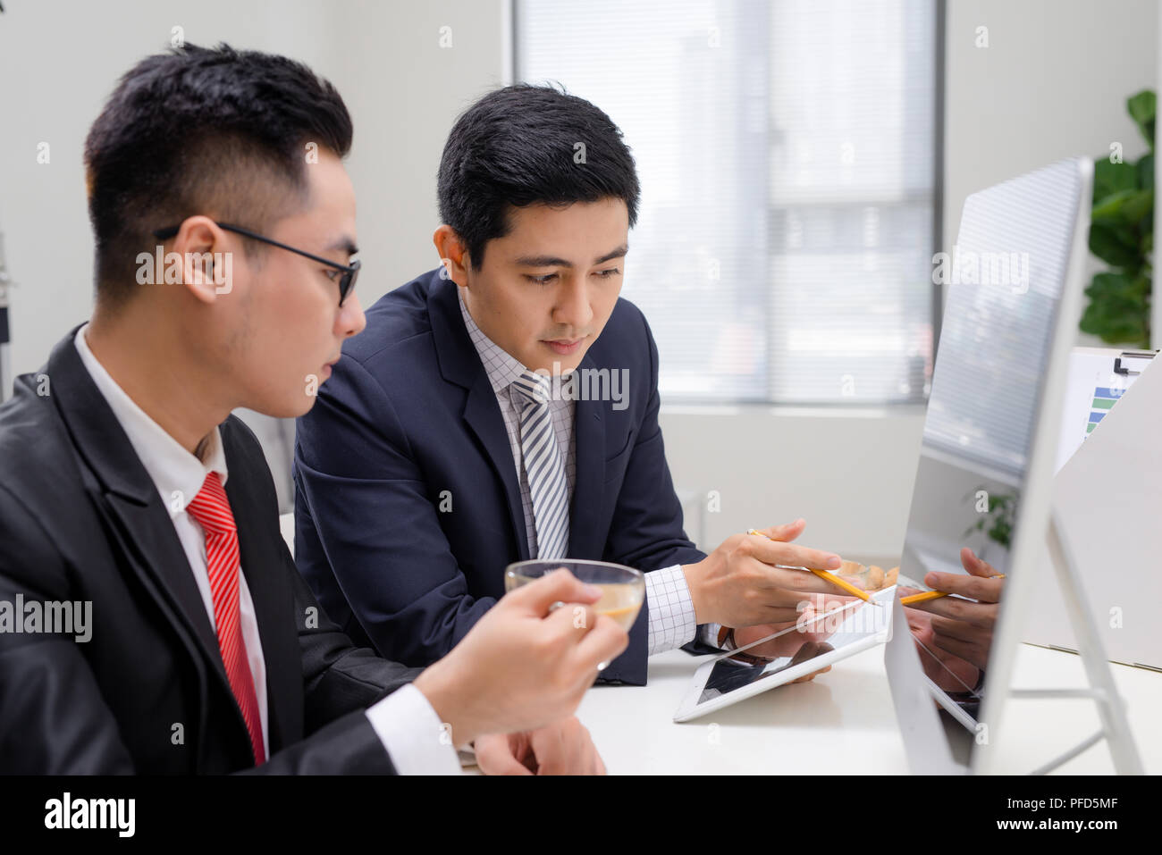 portrait of a good team work at office Stock Photo - Alamy