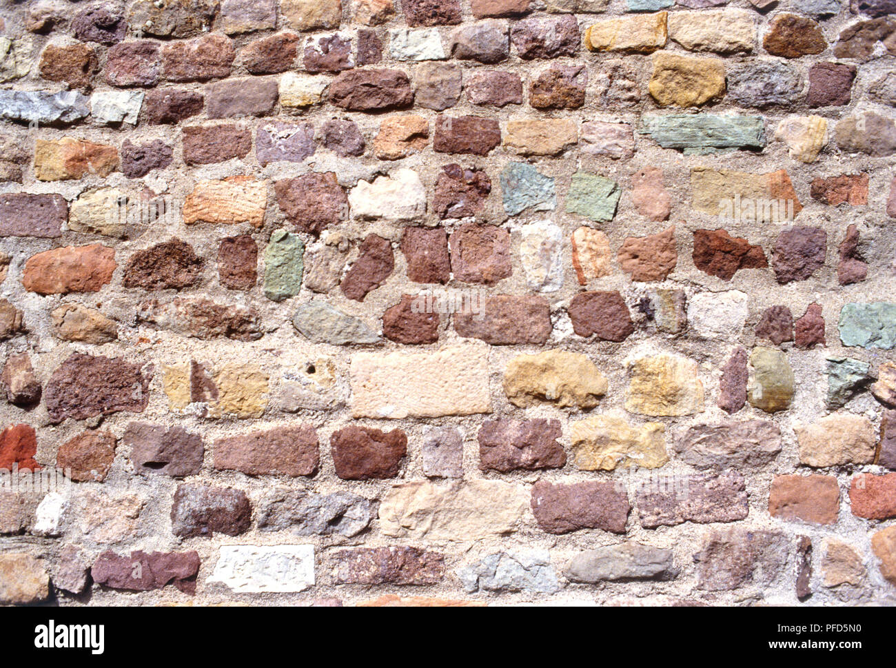 France, Provence, wall made from coloured stone bricks Stock Photo - Alamy