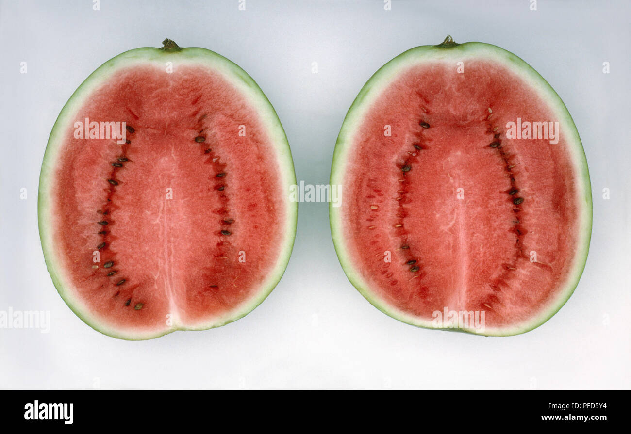 Watermelon cut in half, close-up Stock Photo - Alamy