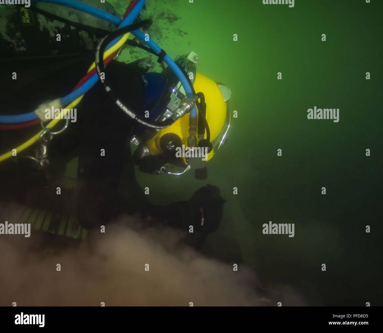 U.S. Army Sgt. Fred Bible, assigned to 7th Engineer Dive Detachment ...