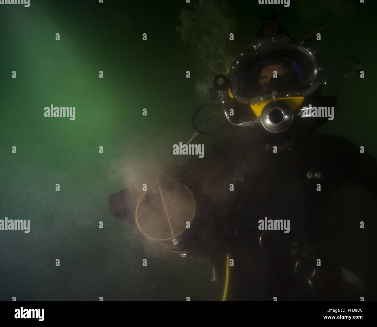 U.S. Army Sgt. Fred Bible, assigned to 7th Engineer Dive Detachment ...