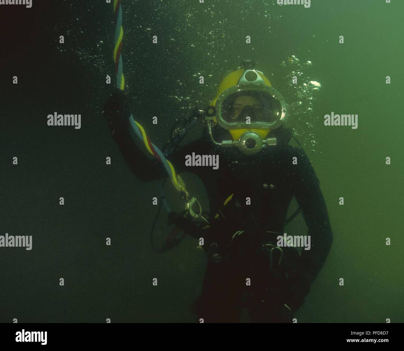 U.S. Army Sgt. Fred Bible, assigned to 7th Engineer Dive Detachment ...