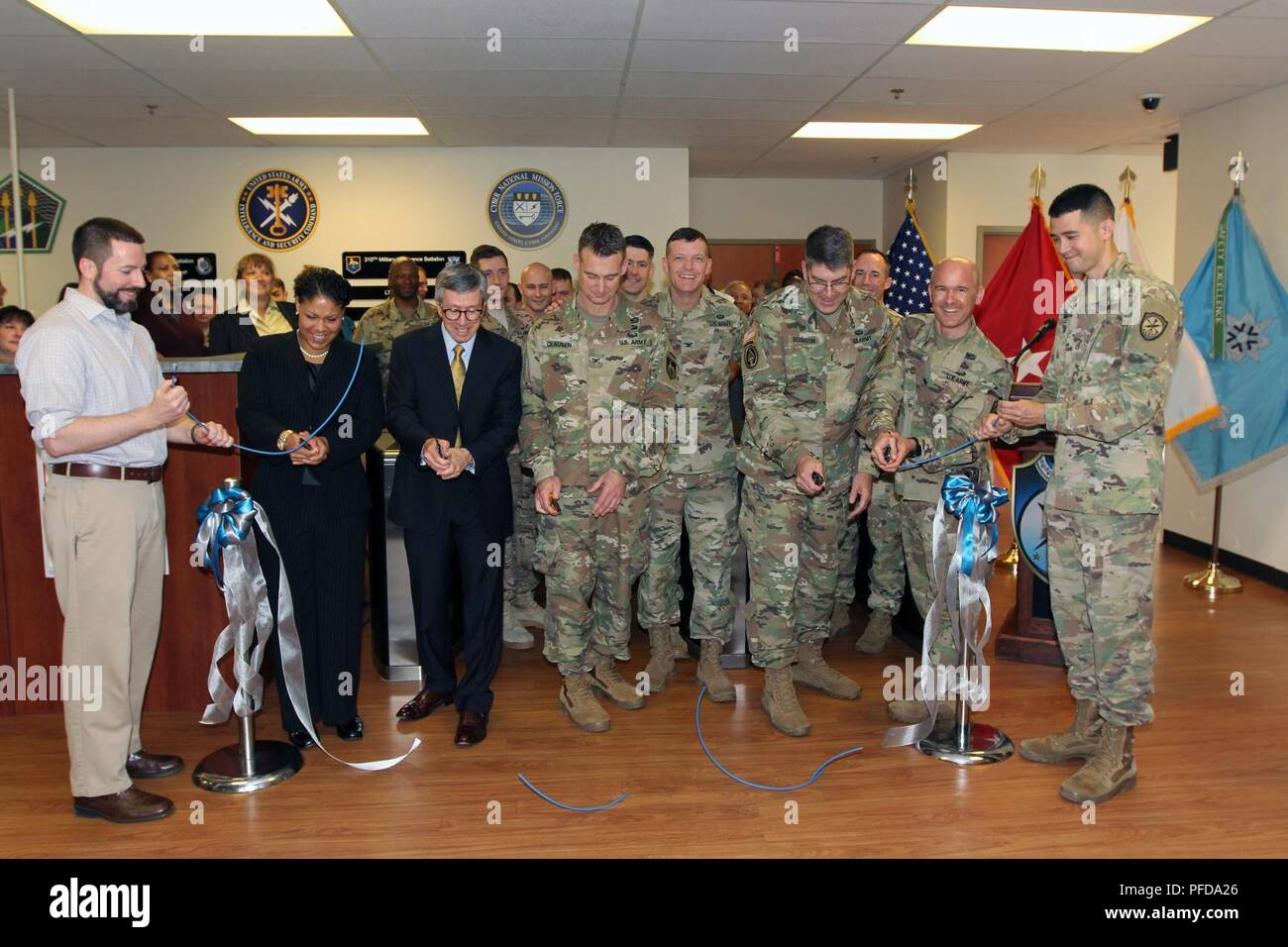 (From left to right) Taneshina Wright; Clyde Harthcock, deputy to the ...