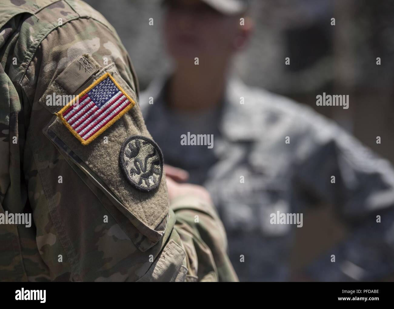 Maj. Jason Gracida, the 2-116 battalion commander, talks with Master ...