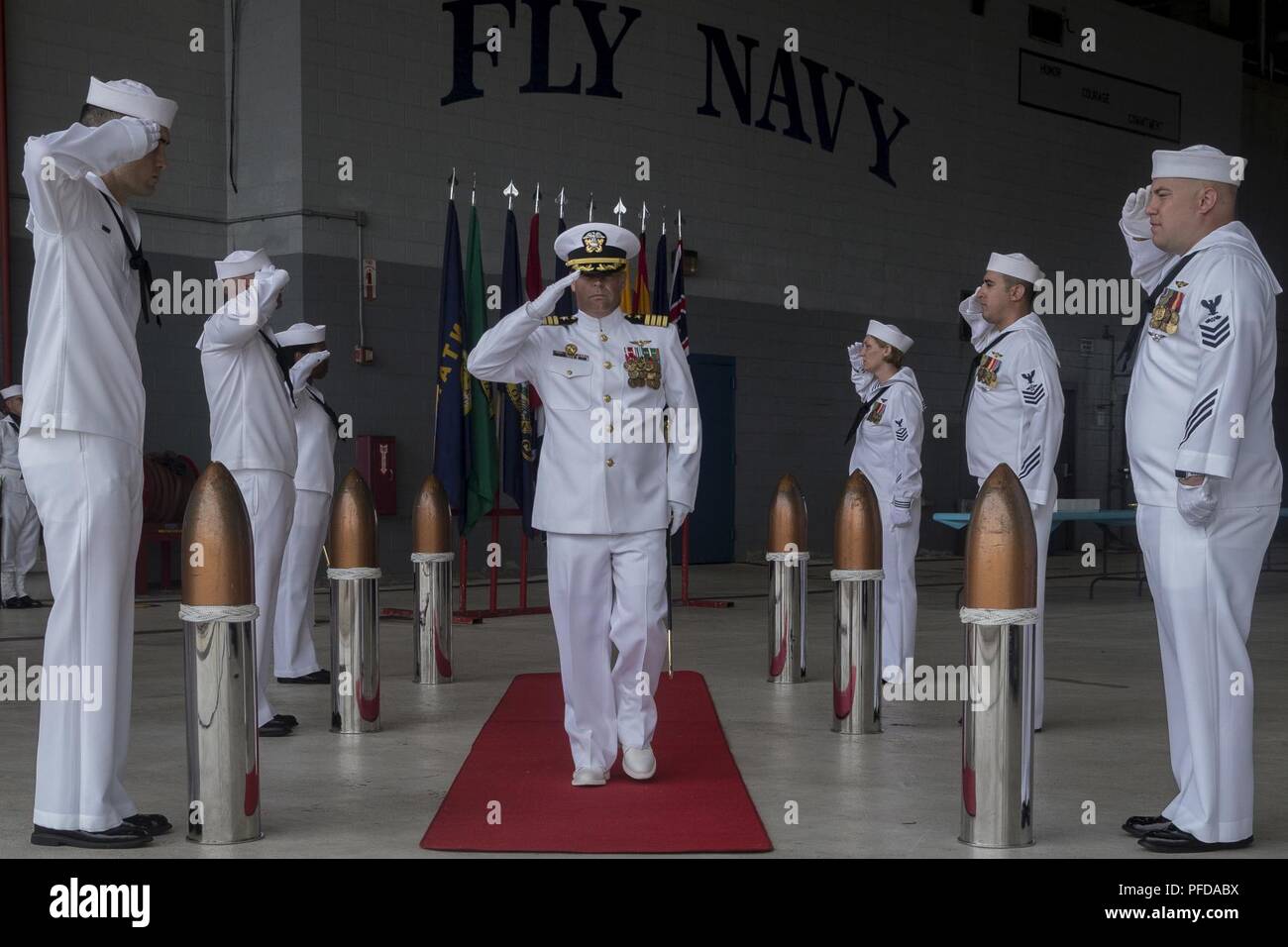 U.S. Navy Capt. Chad Baker, commander, Fleet Logistics Support Wing ...