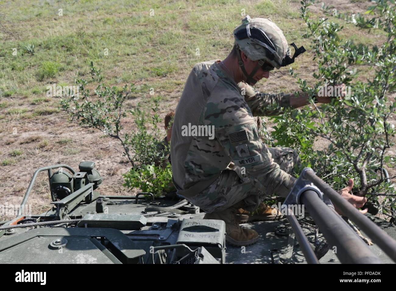 Sgt. Ethan Meyer, 3rd Cavalry Regiment, Fort Hood, Texas, applies ...