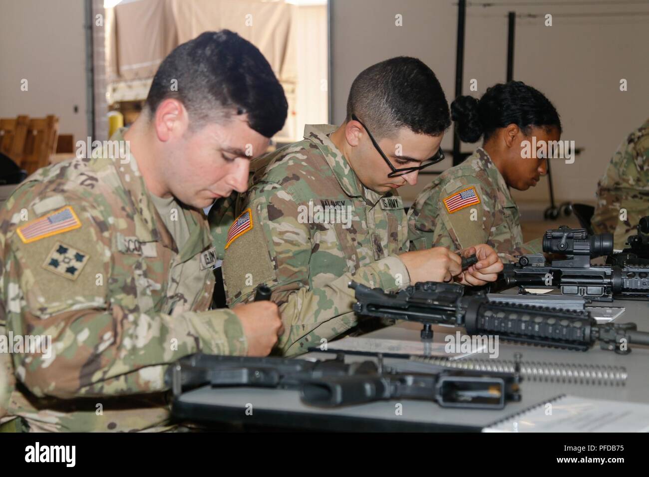 Soldiers assigned to HHC 201st Regional Support Group disassemble their ...