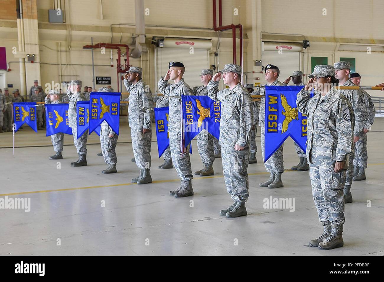 Airmen from the Louisiana Air National Guard present their unit guidons ...
